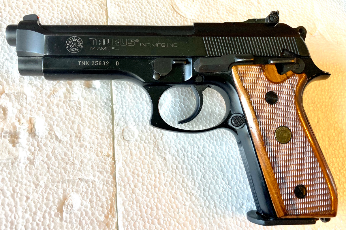 Taurus PT99 PISTOL WITH 4 17-RD MAGAZINES. ADJUSTABLE SIGHTS, WOOD ...