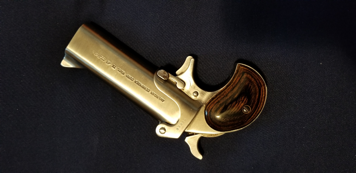 American Derringer M4 45 Long Colt/ 410 Stainless Steel.... Well Made ...