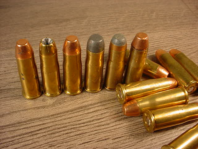13 Rounds of Mixed Manufacture .38-40 Win. Lead, Plated & Semi-Jacketed ...