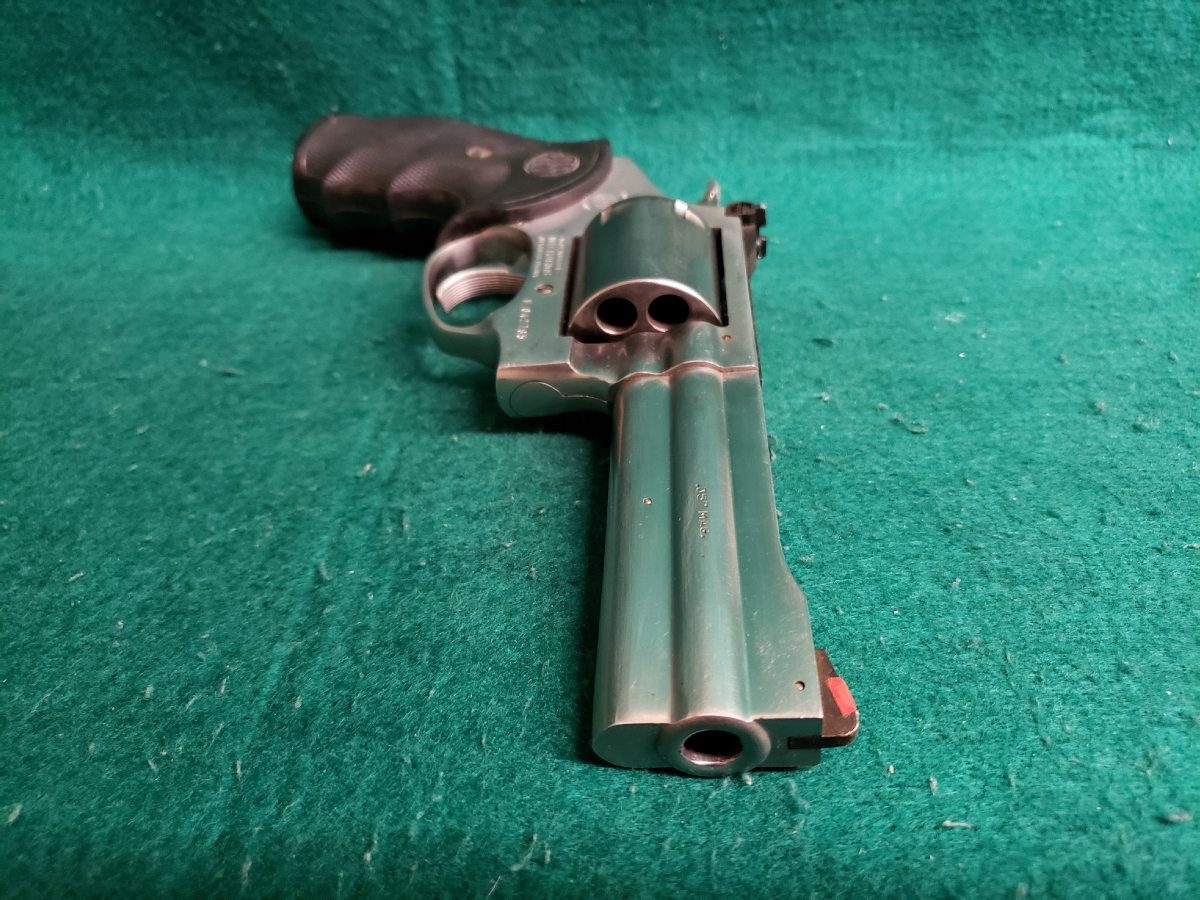 Rossi Model - 711 Stainless Double Action 6 Shot 4 Inch Barrel. Factory ...