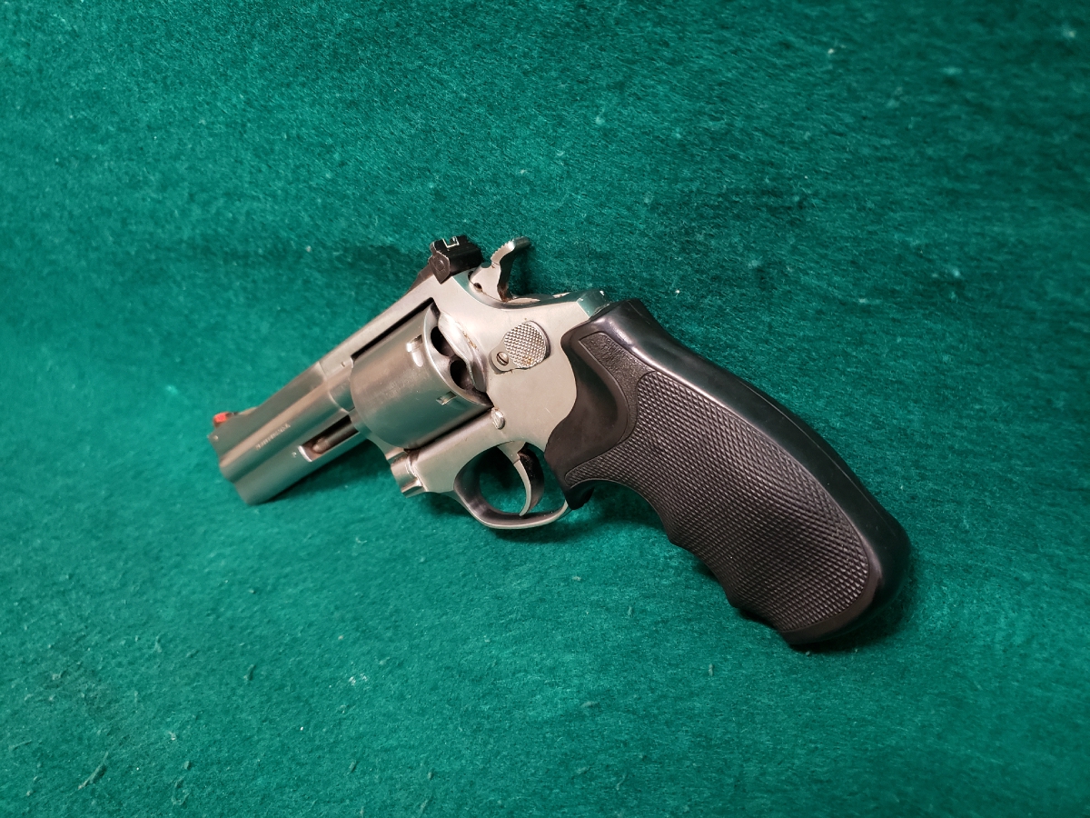 Rossi Model - 711 Stainless Double Action 6 Shot 4 Inch Barrel. Factory ...