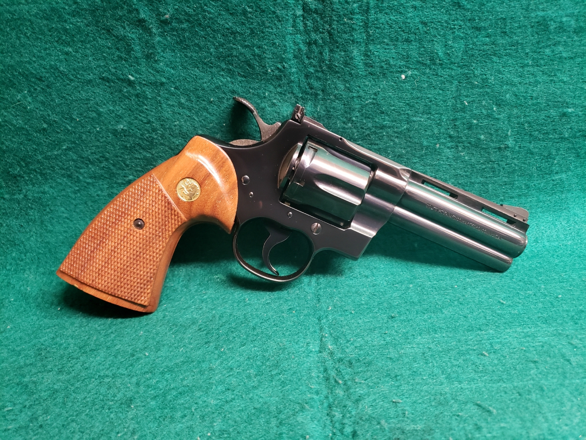 Colt Pt. Fa. Mfg. Co. Python - Blued. 4 Inch Barrel. Wood Grips. Minty Bore Excellent Collector ...