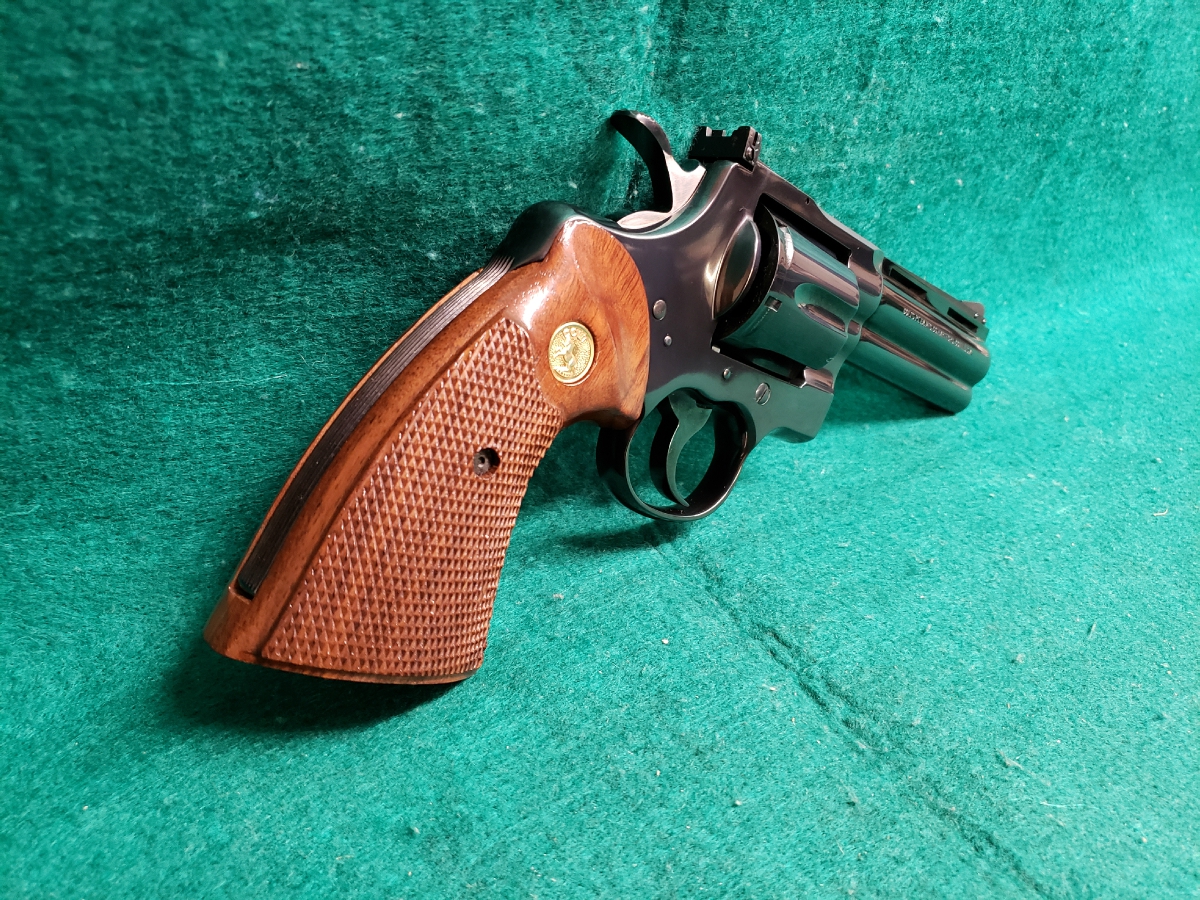 Colt - PYTHON - BLUED. 4 INCH BARREL. ORIGINAL GRIPS. W-OWNERS MANUAL ...