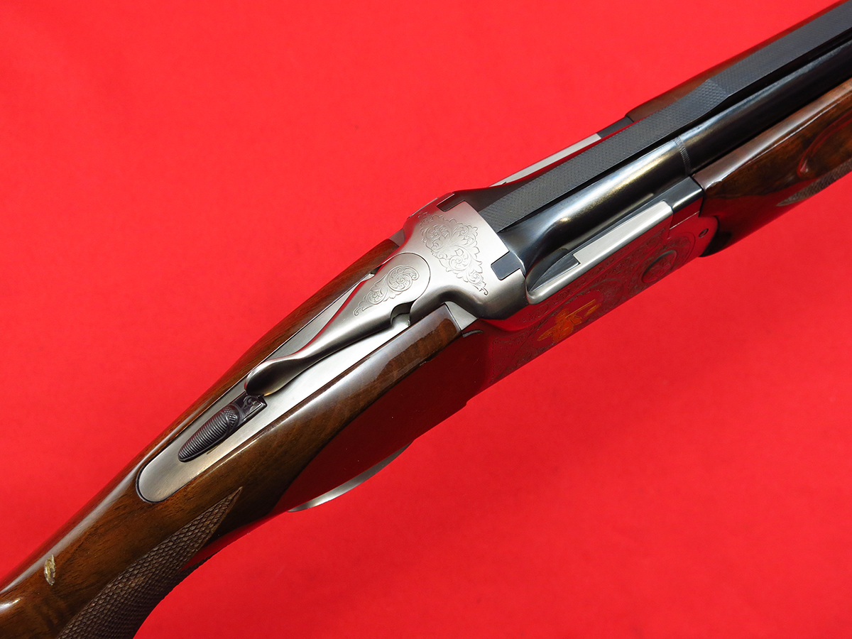 SKB Shotguns MODEL 685 TARGET O/U 12 GA...28" BBLS, CHOKES, SILVER/GOLD ...