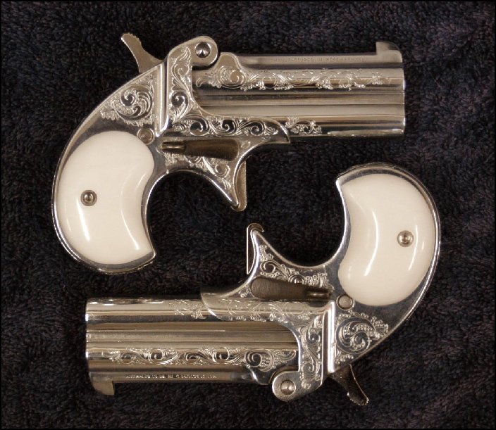 Frontier Derringer Mfg by Reck Matched pair of Engraved Derringers in .22LR