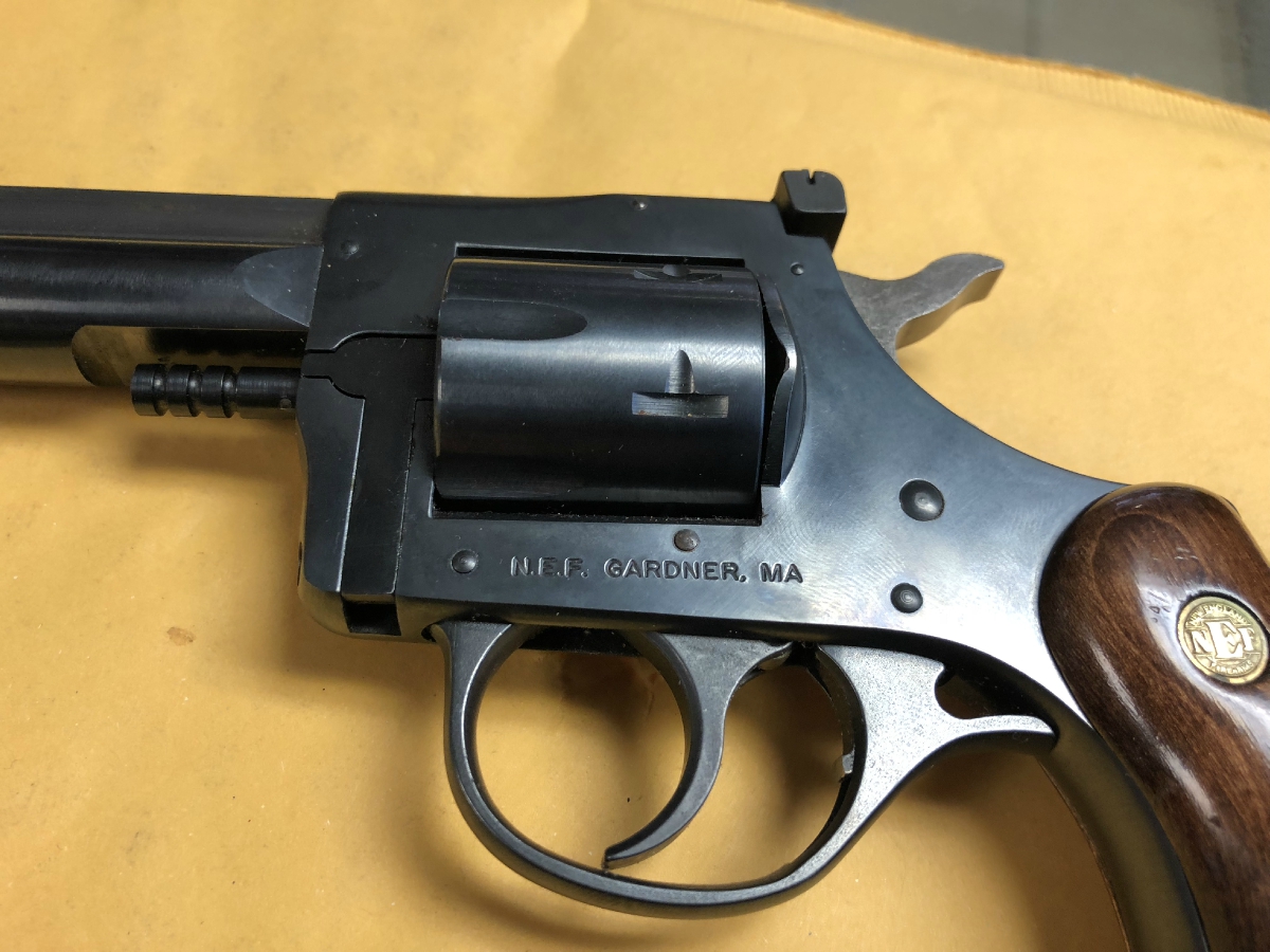 NEW ENGLAND FIREARMS - MODEL R22 ULTRA MAG 22 WMRF 6 SHOT DOUBLE ACTION ...