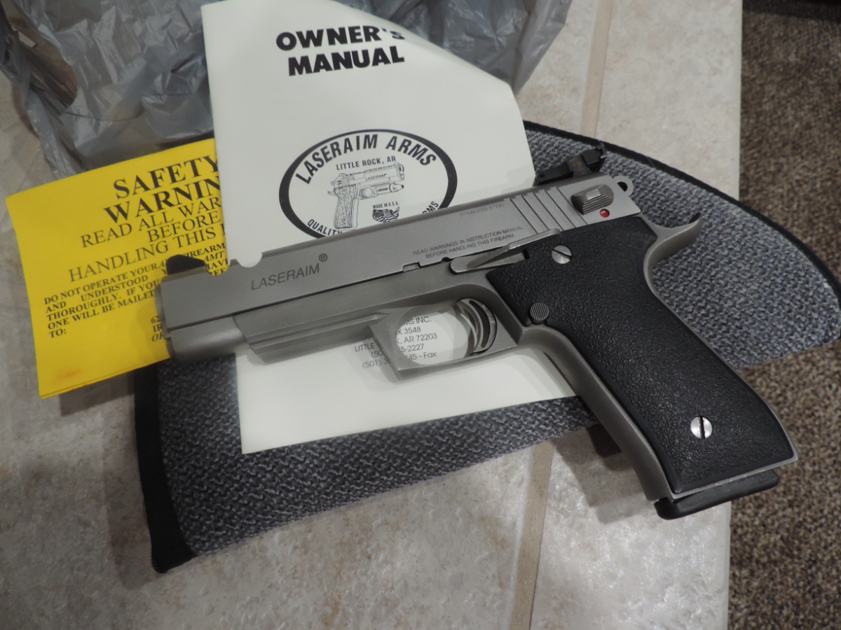 LASERAIM BY AMT 10 MM PISTOL IN GREAT SHAPE WITH NO RESERVE