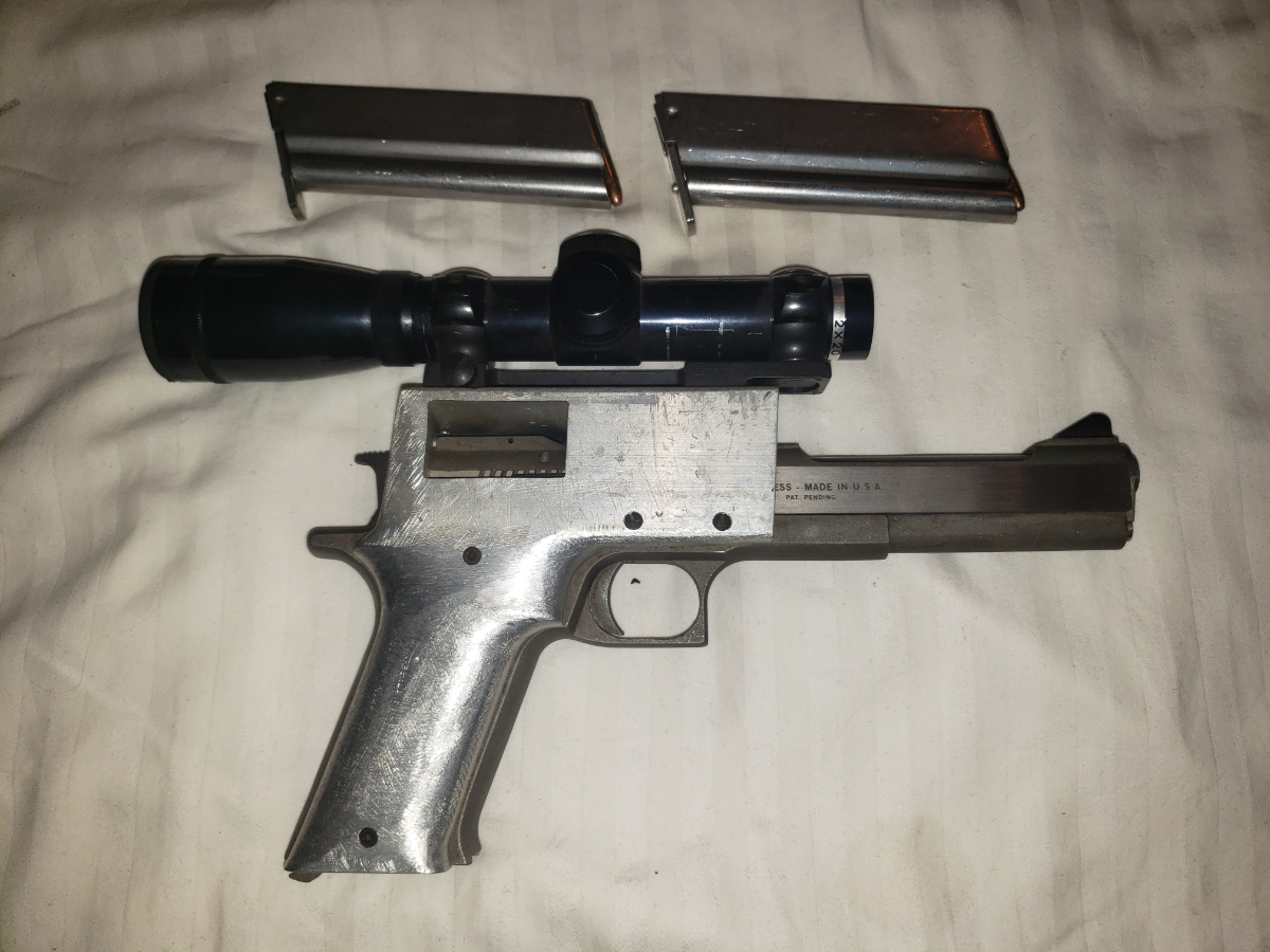 AMT Stailess steel, auto mag II , with scope and factory box. I made ...