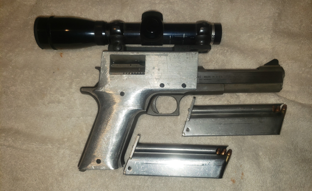 AMT Stailess steel, auto mag II , with scope and factory box. I made ...