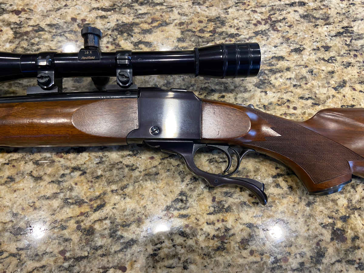 This is a Ruger Number One with a semi vintage Redfield 16 Power Scope ...