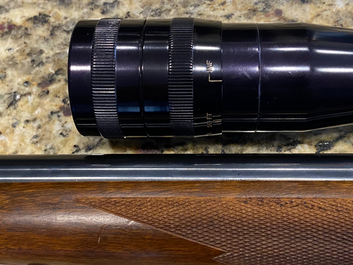 This is a Ruger Number One with a semi vintage Redfield 16 Power Scope ...